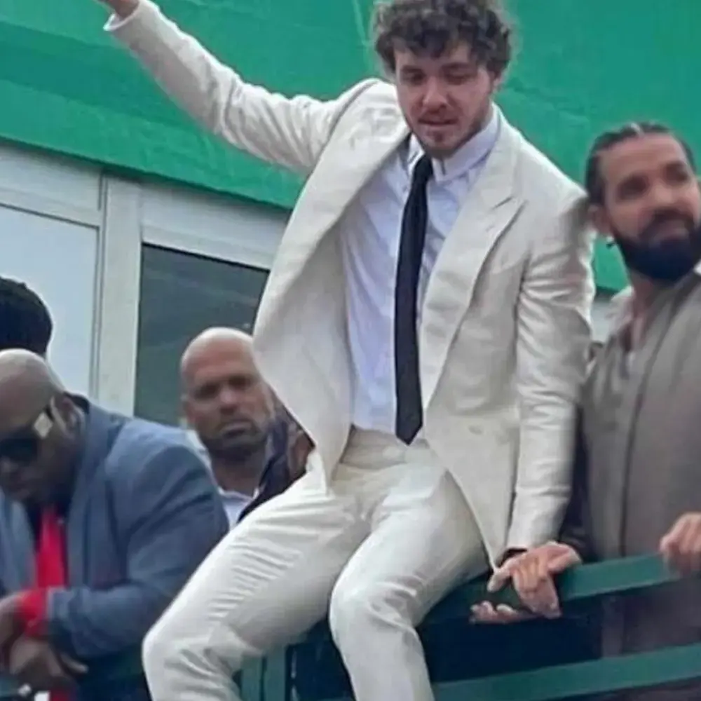 Jack Harlow On Couch In White Suit